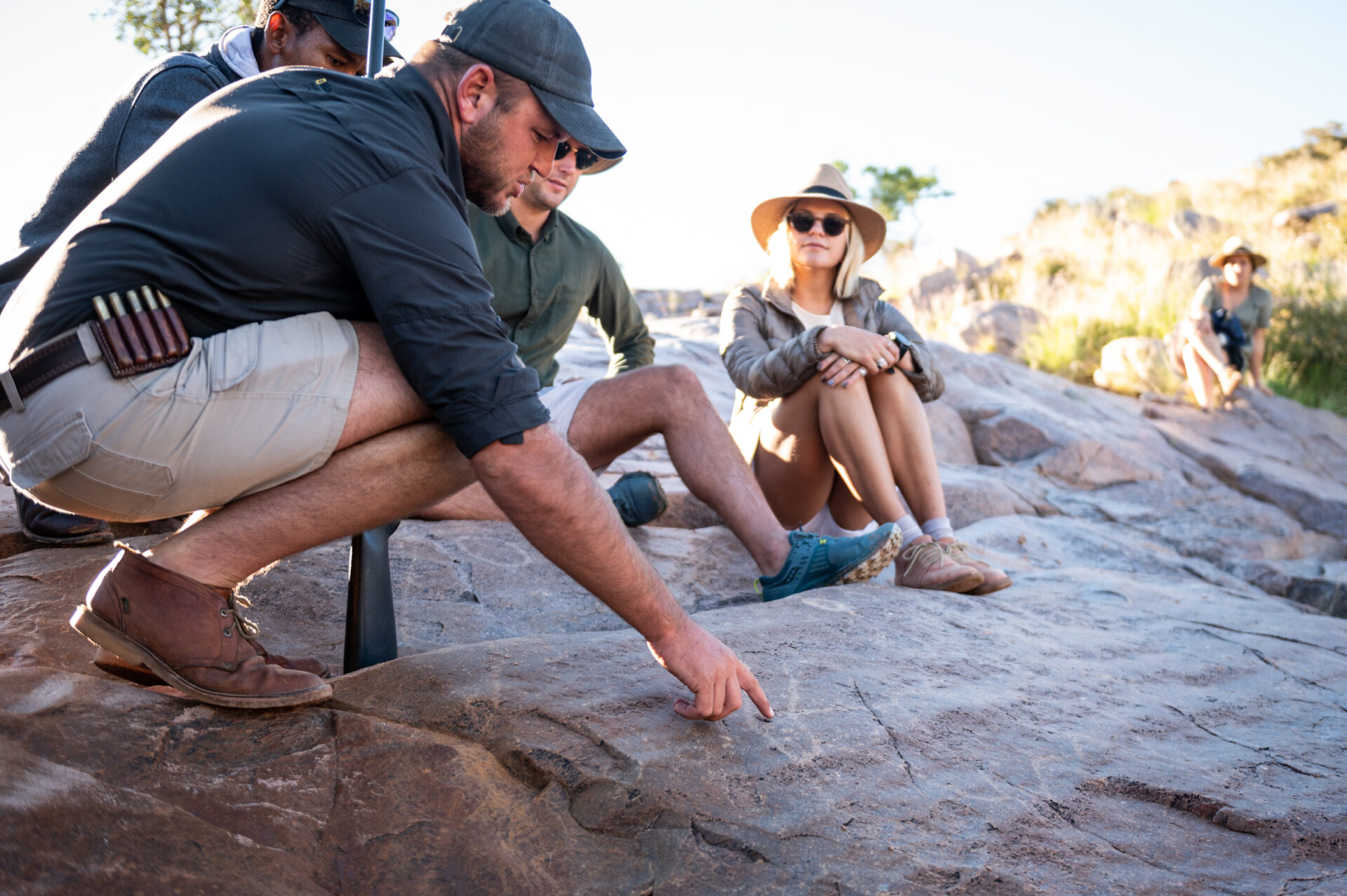 Discovering rock art sites on a guided walk | Tswalu